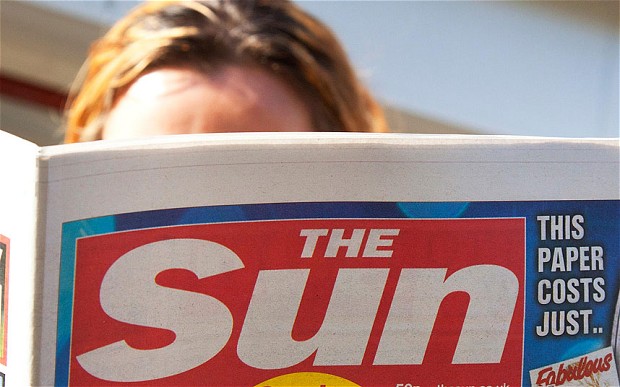 UK to charge 2 journalists for The Sun newspaper