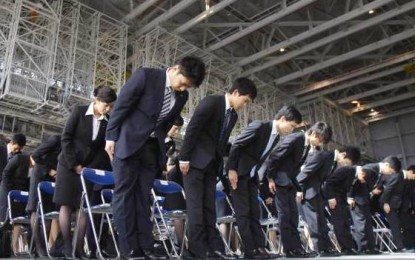 Japan mulls adopting flexible work hours, regulations